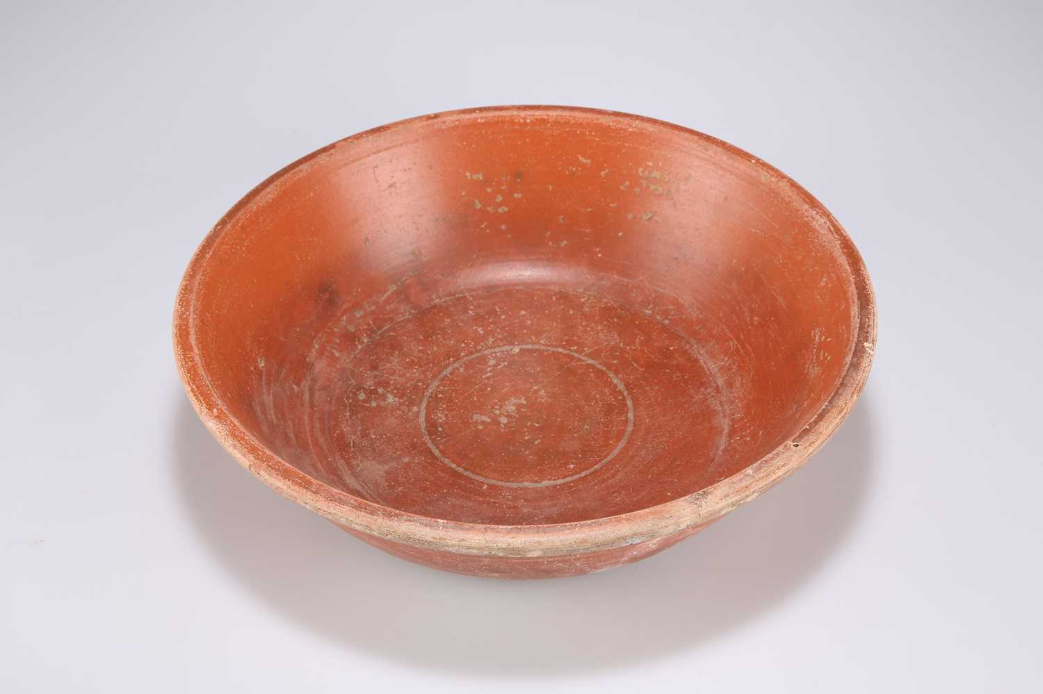 Lot 1013 - A ROMAN TERRACOTTA REDWARE DISH, NORTH