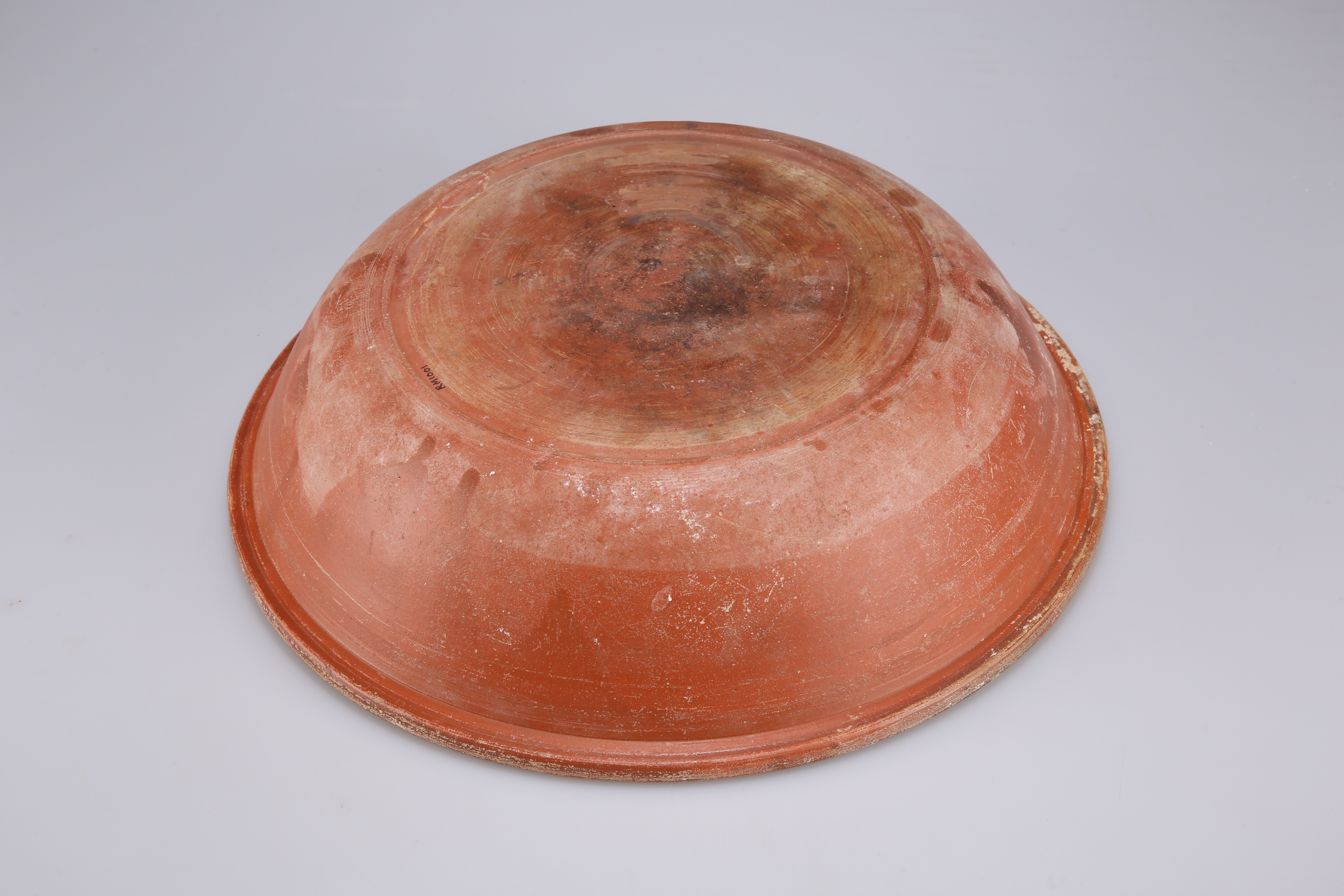 Lot 1013 - A ROMAN TERRACOTTA REDWARE DISH, NORTH