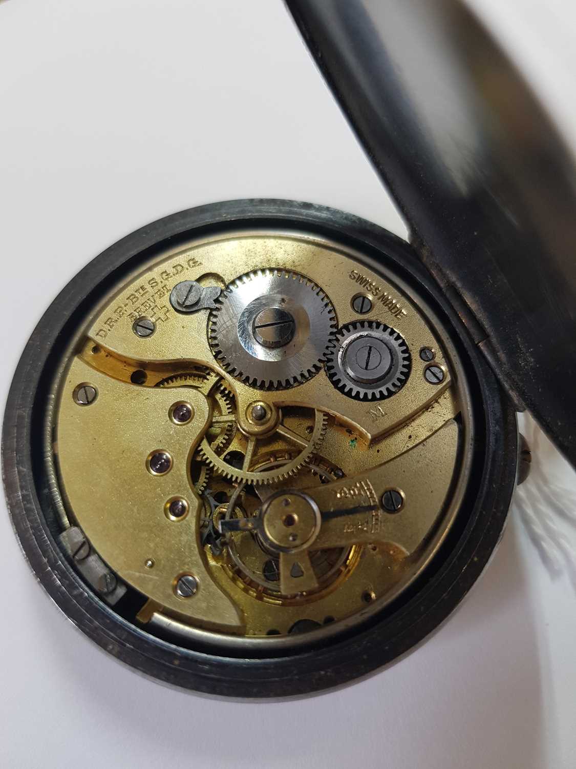 Lot 469 - A RENOVA GUN METAL ALARM POCKET WATCH