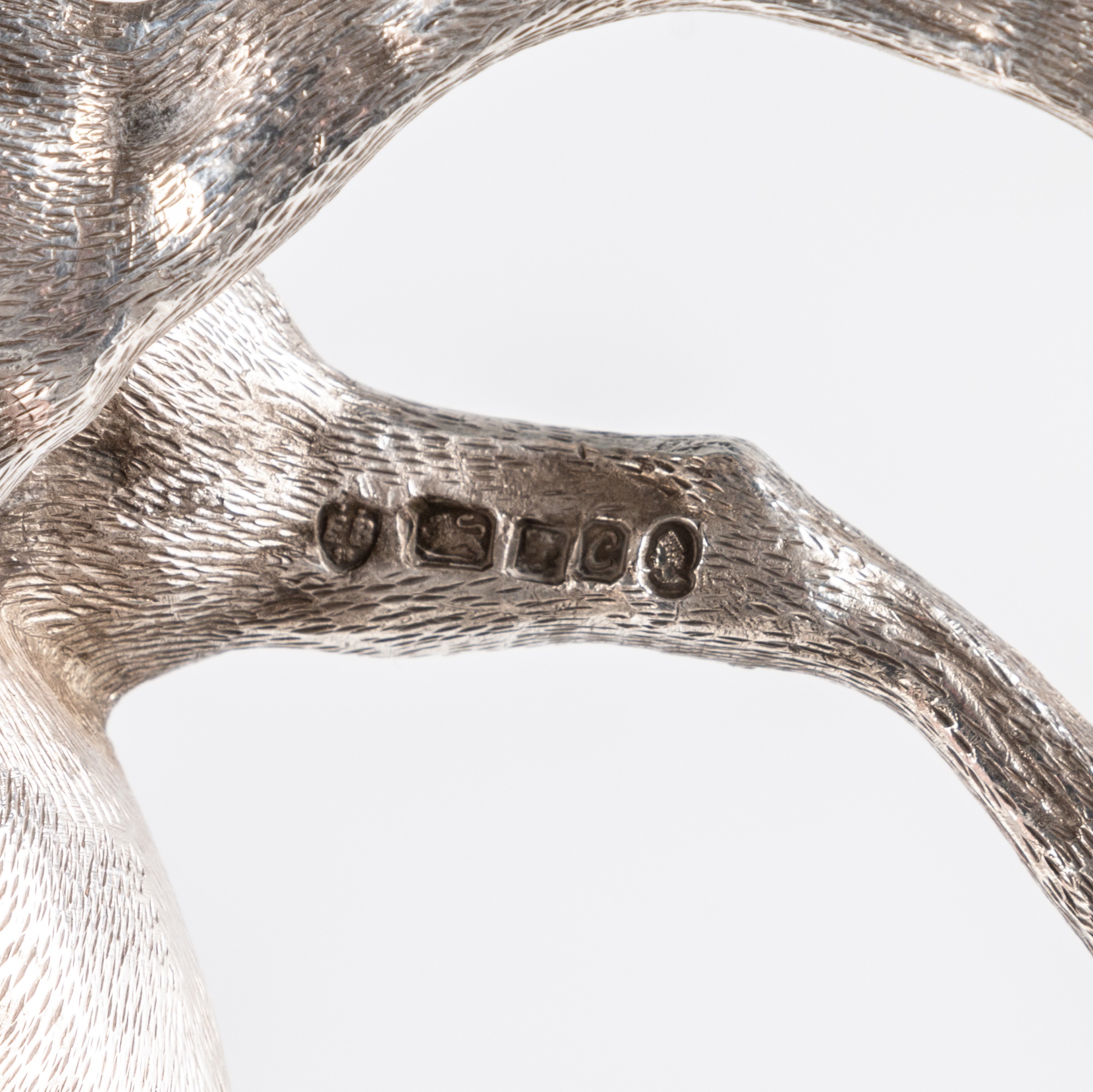 Lot 208 - A PAIR OF ELIZABETH II CAST SILVER MODELS OF