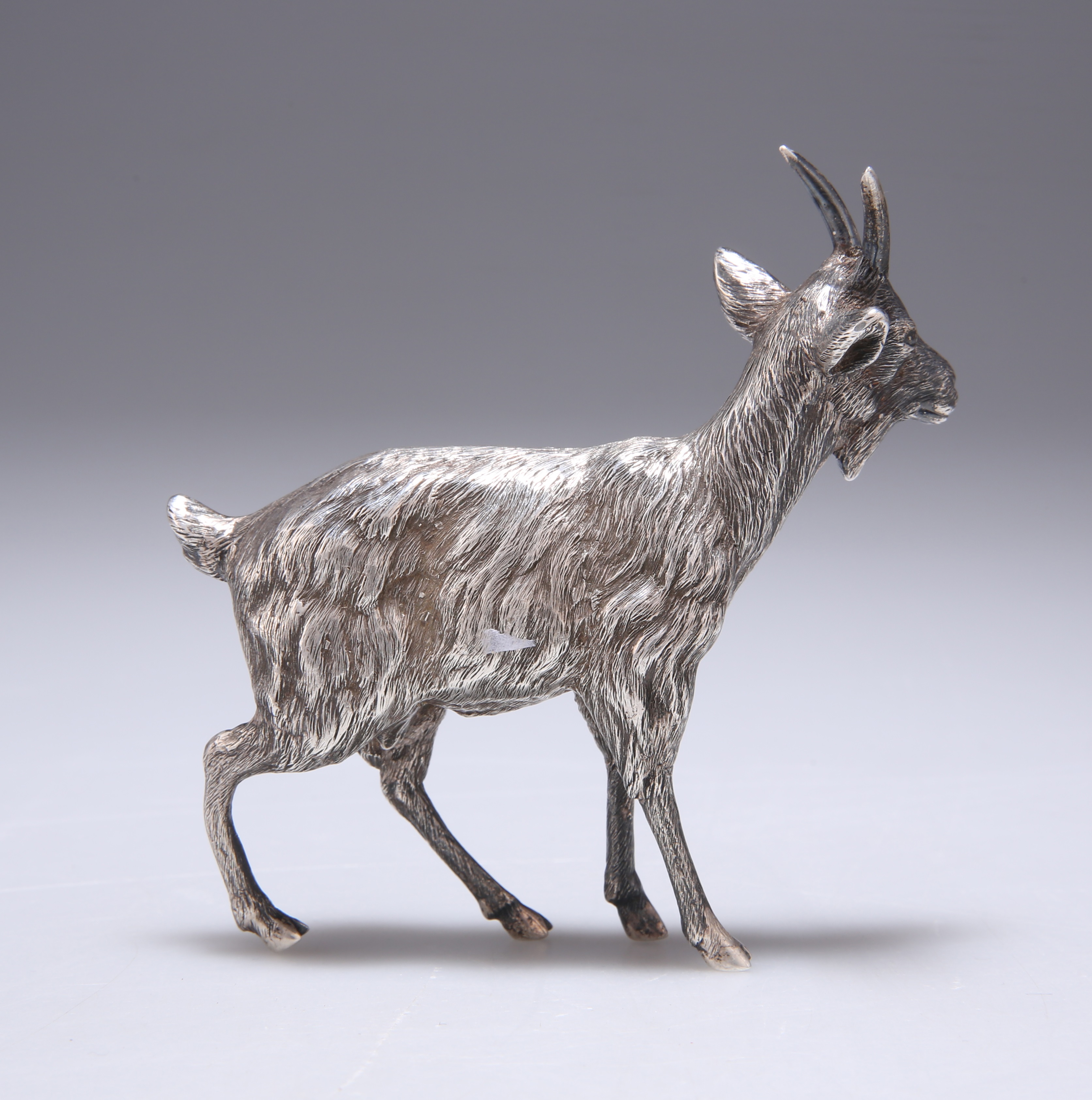 Lot 199 - AN ELIZABETH II SILVER MODEL OF A GOAT