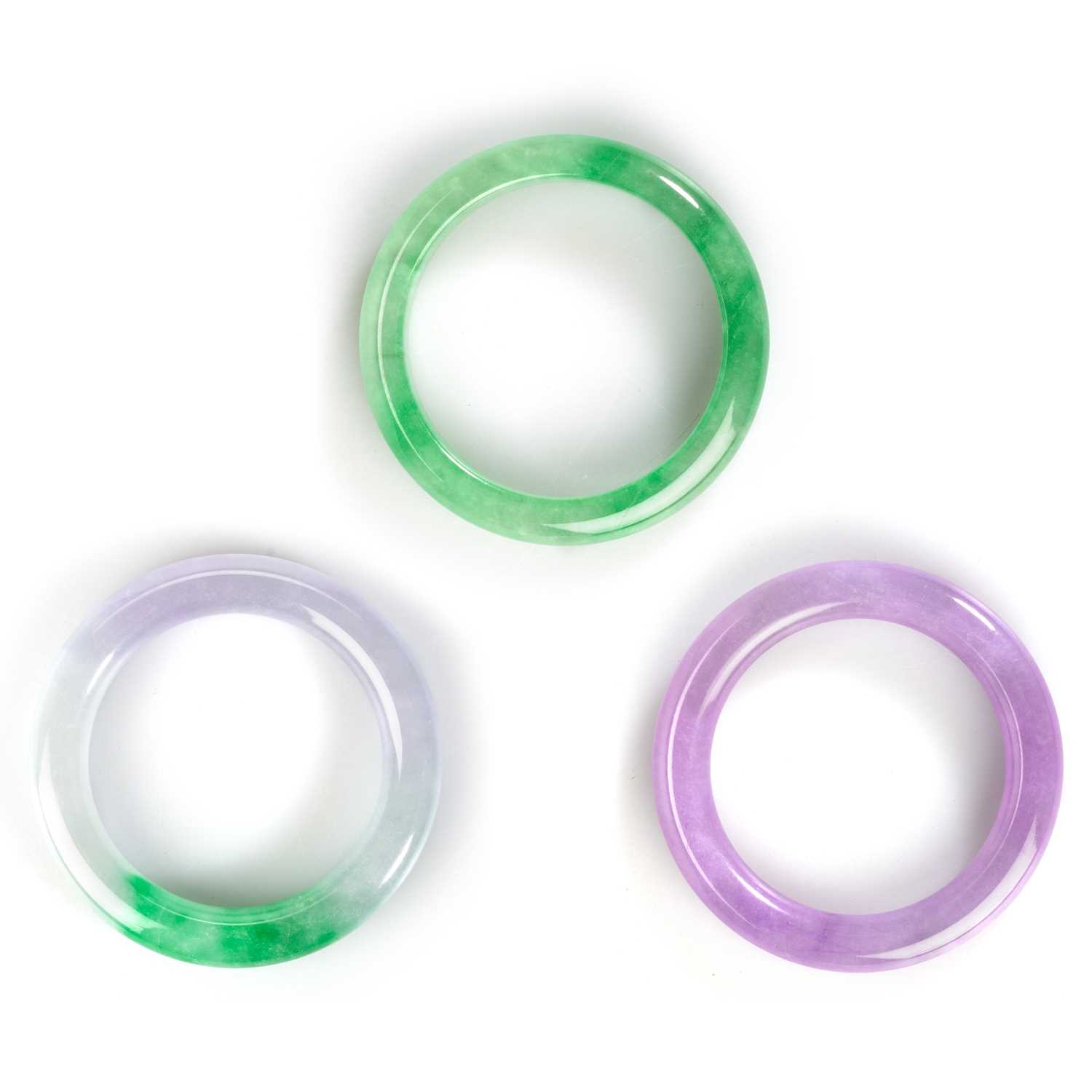 Lot 168 - THREE CHINESE JADE BANGLES