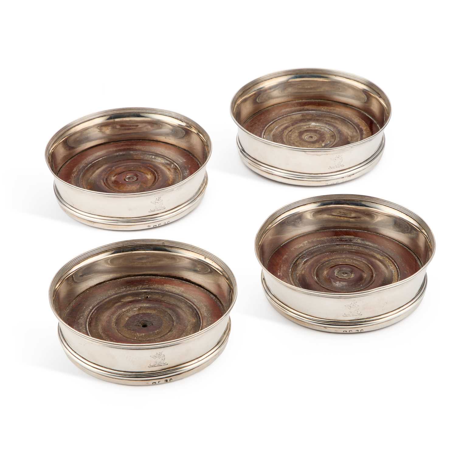 Lot 482 - A SET OF FOUR GEORGE III SILVER COASTERS