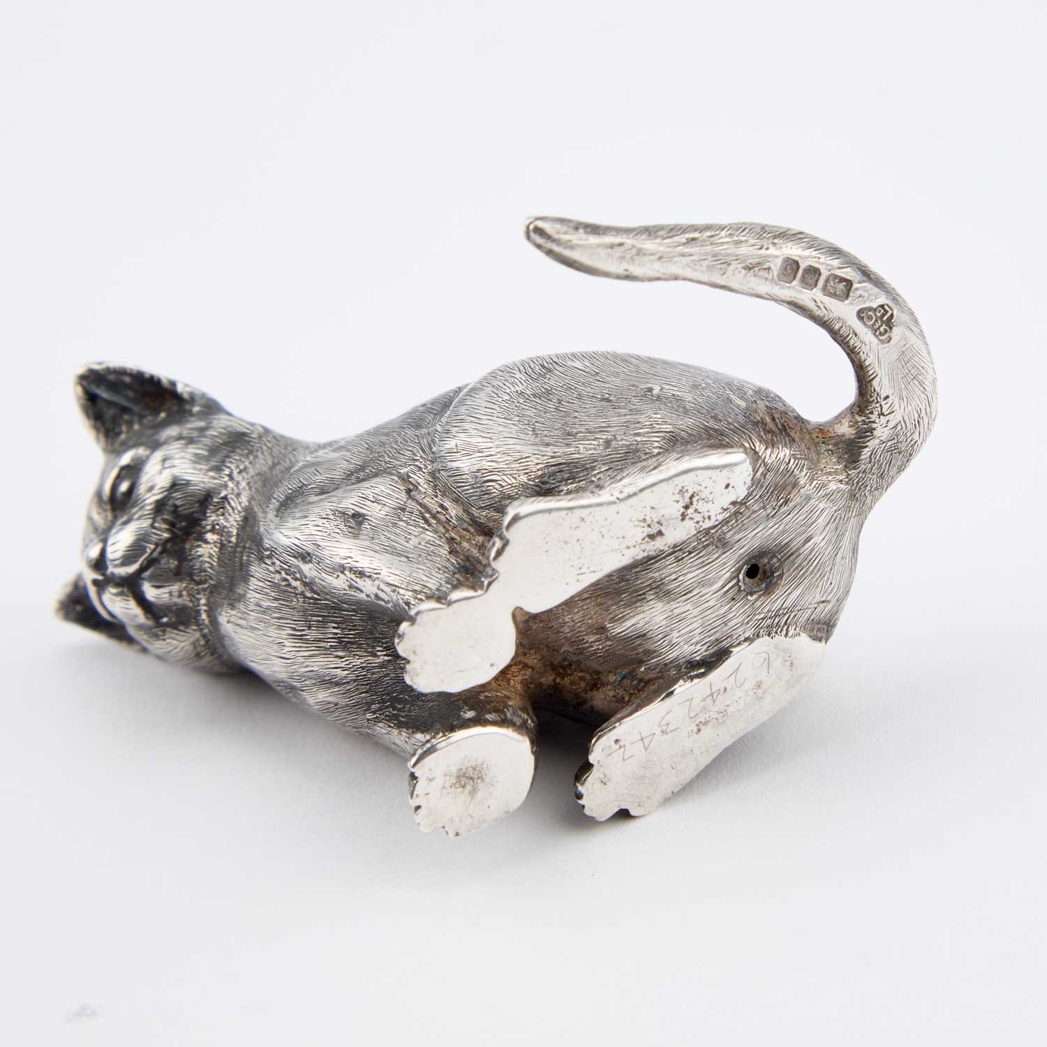 Lot 222 - AN ELIZABETH II CAST SILVER MODEL OF A CAT