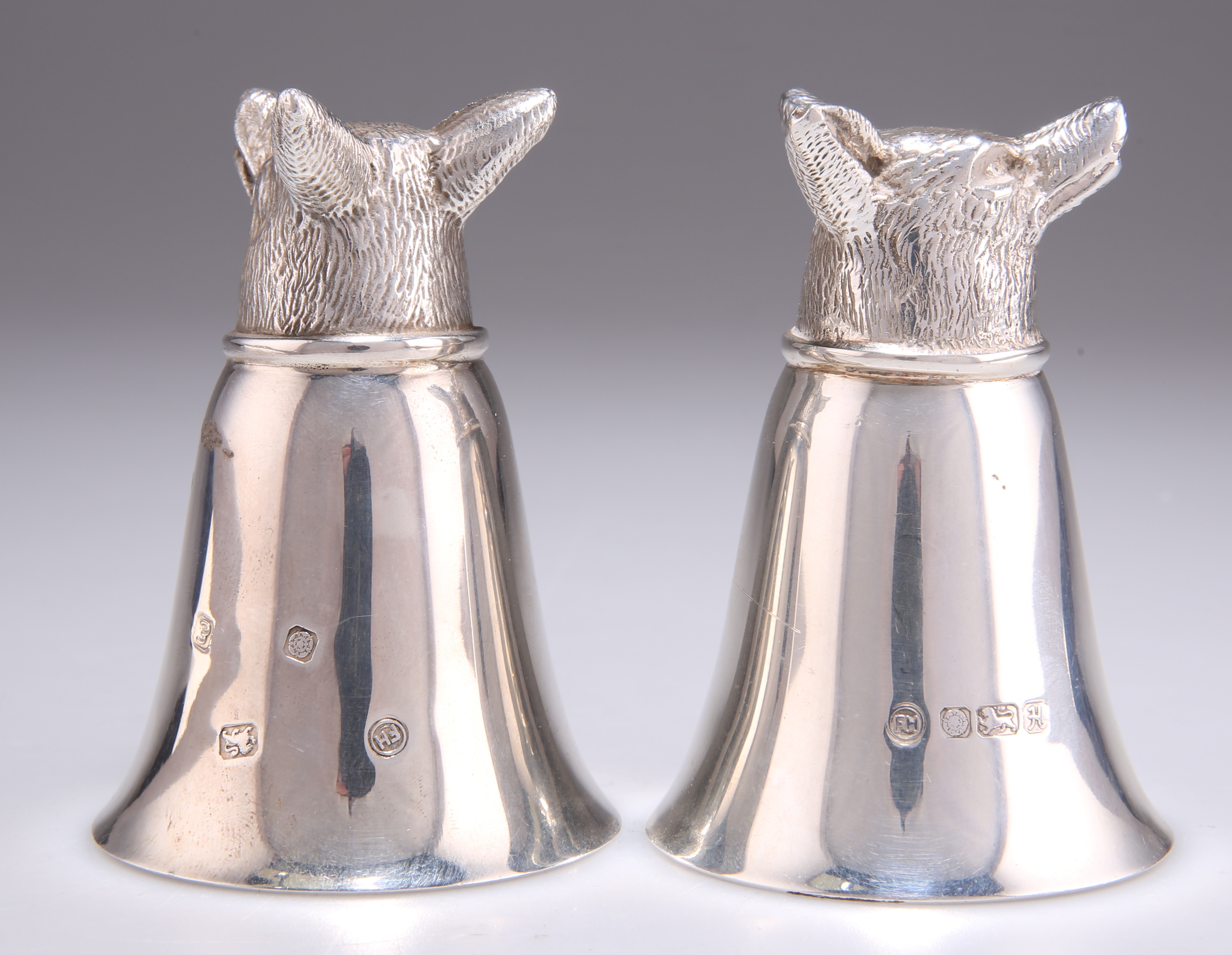Lot 1190 - A PAIR OF ELIZABETH II SILVER STIRRUP CUPS