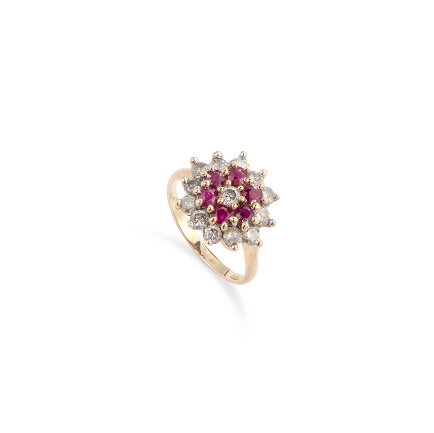 Lot 461 - A 9 CARAT GOLD RUBY AND DIAMOND CLUSTER RING