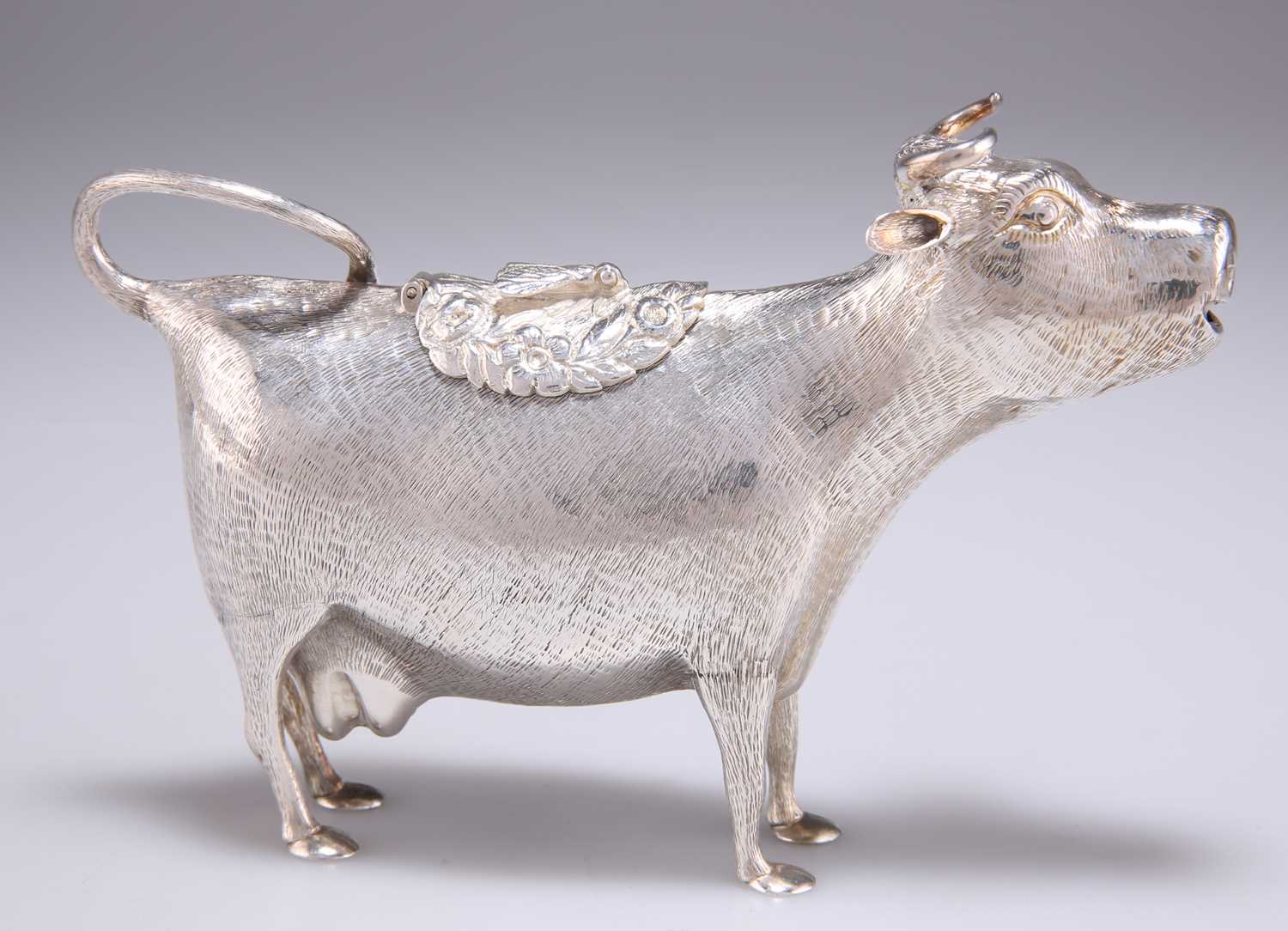 Lot 1171 - AN ELIZABETH II SILVER COW CREAMER