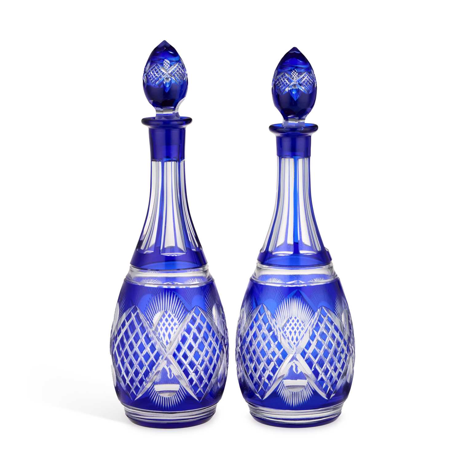 Lot 81 - A PAIR OF BOHEMIAN BLUE FLASH GLASS DECANTERS