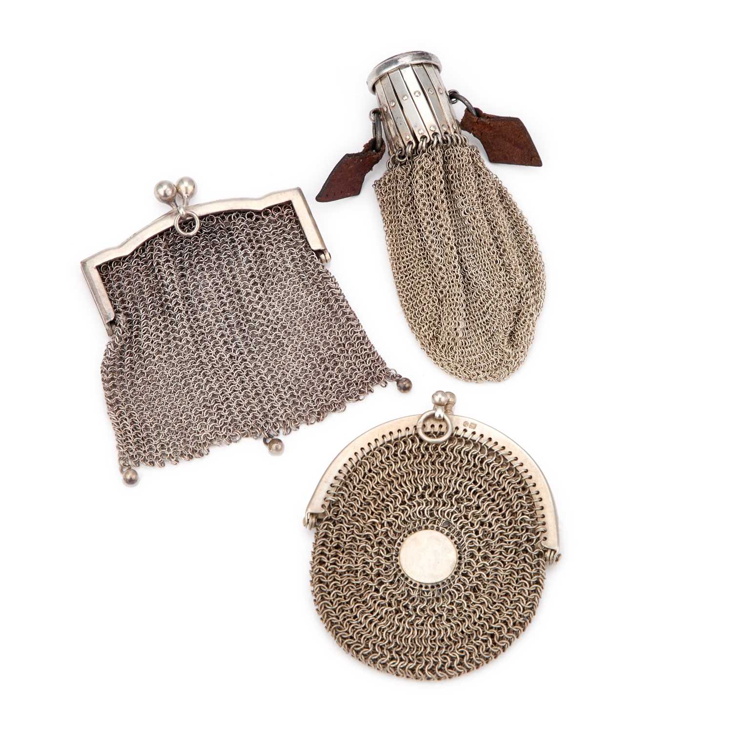 Lot 568 - THREE SILVER MESH PURSES