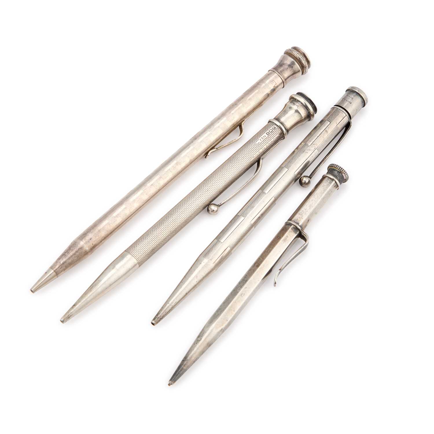 Lot 618 - A GROUP OF FOUR SILVER PROPELLING PENCILS