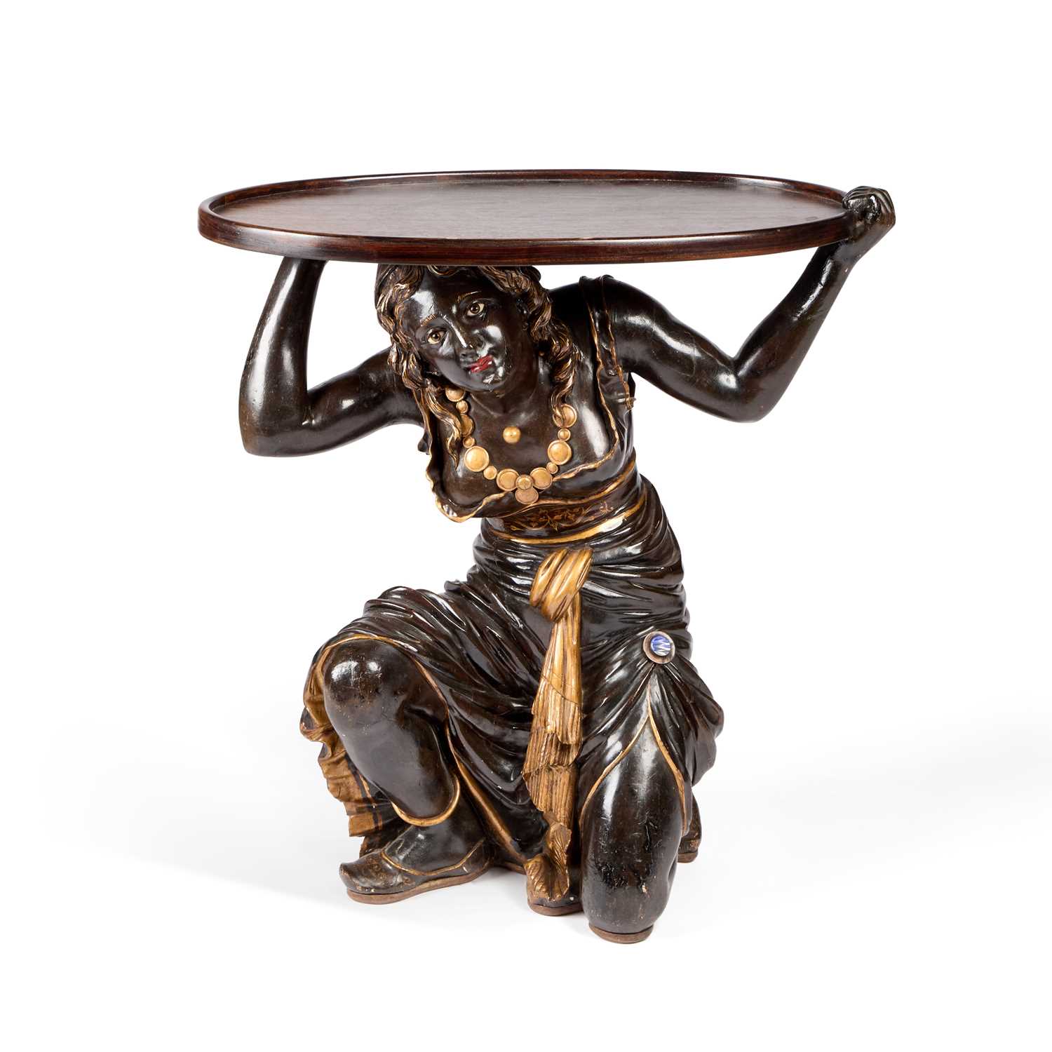 Lot 402 - A PARCEL-GILT CARVED BLACKAMOOR OCCASIONAL