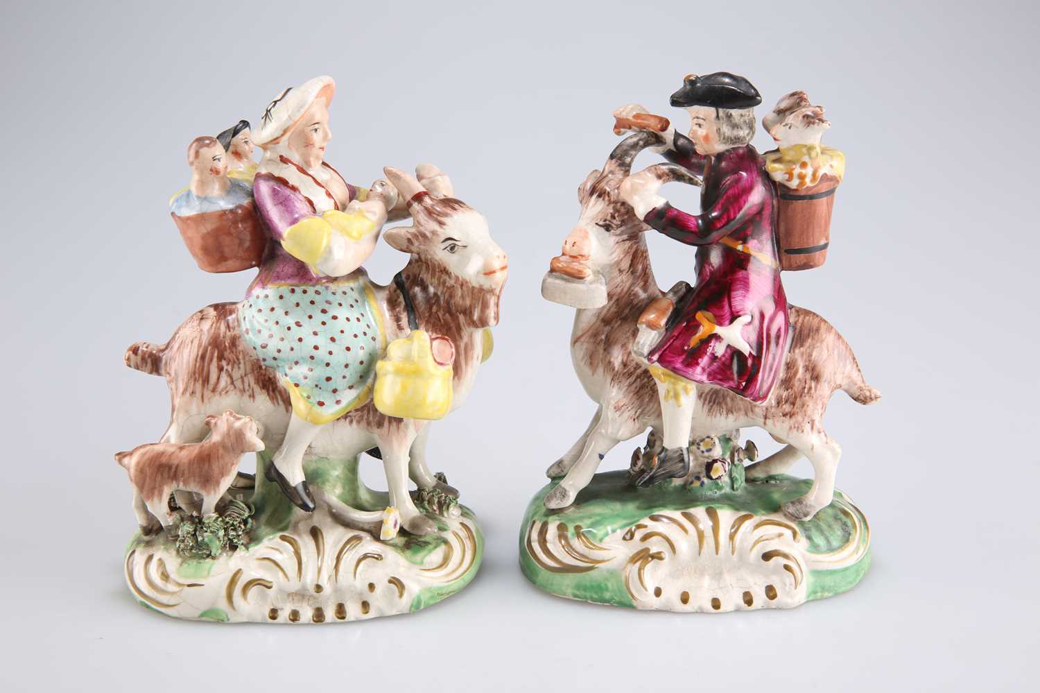 Lot 115 - A PAIR OF STAFFORDSHIRE FIGURES OF THE WELSH