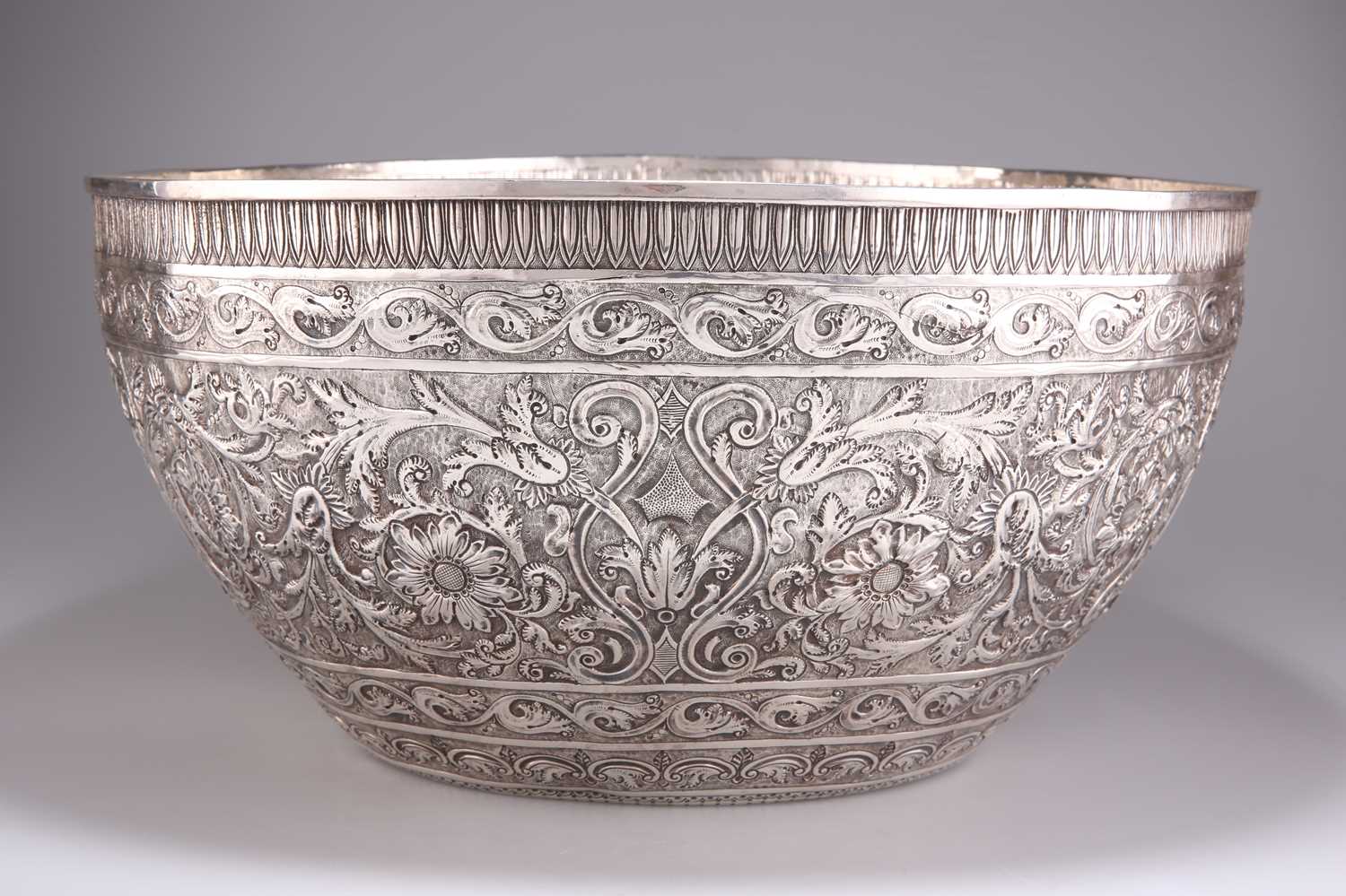 Lot 1016 - A 19TH CENTURY INDIAN SILVER BOWL, OF HUGE