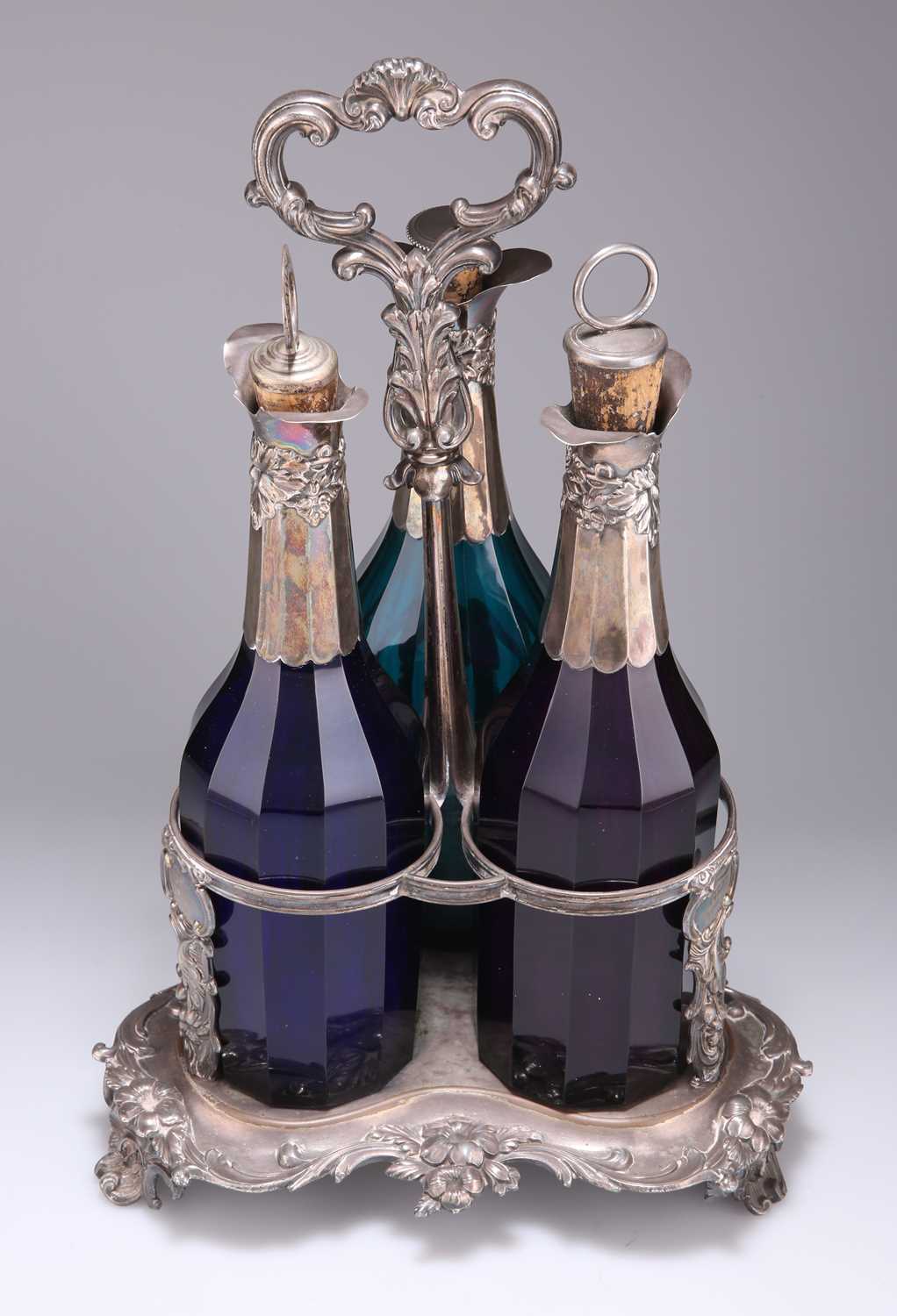 Lot 1013 - AN EARLY VICTORIAN SILVER-PLATED DECANTER