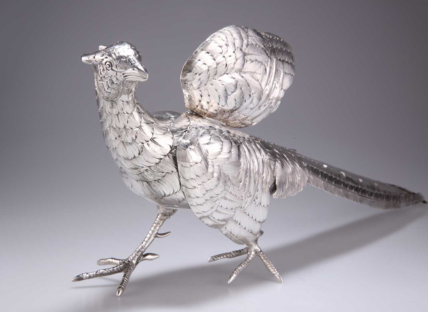 Lot 1059 - A LARGE GERMAN SILVER PHEASANT TABLE