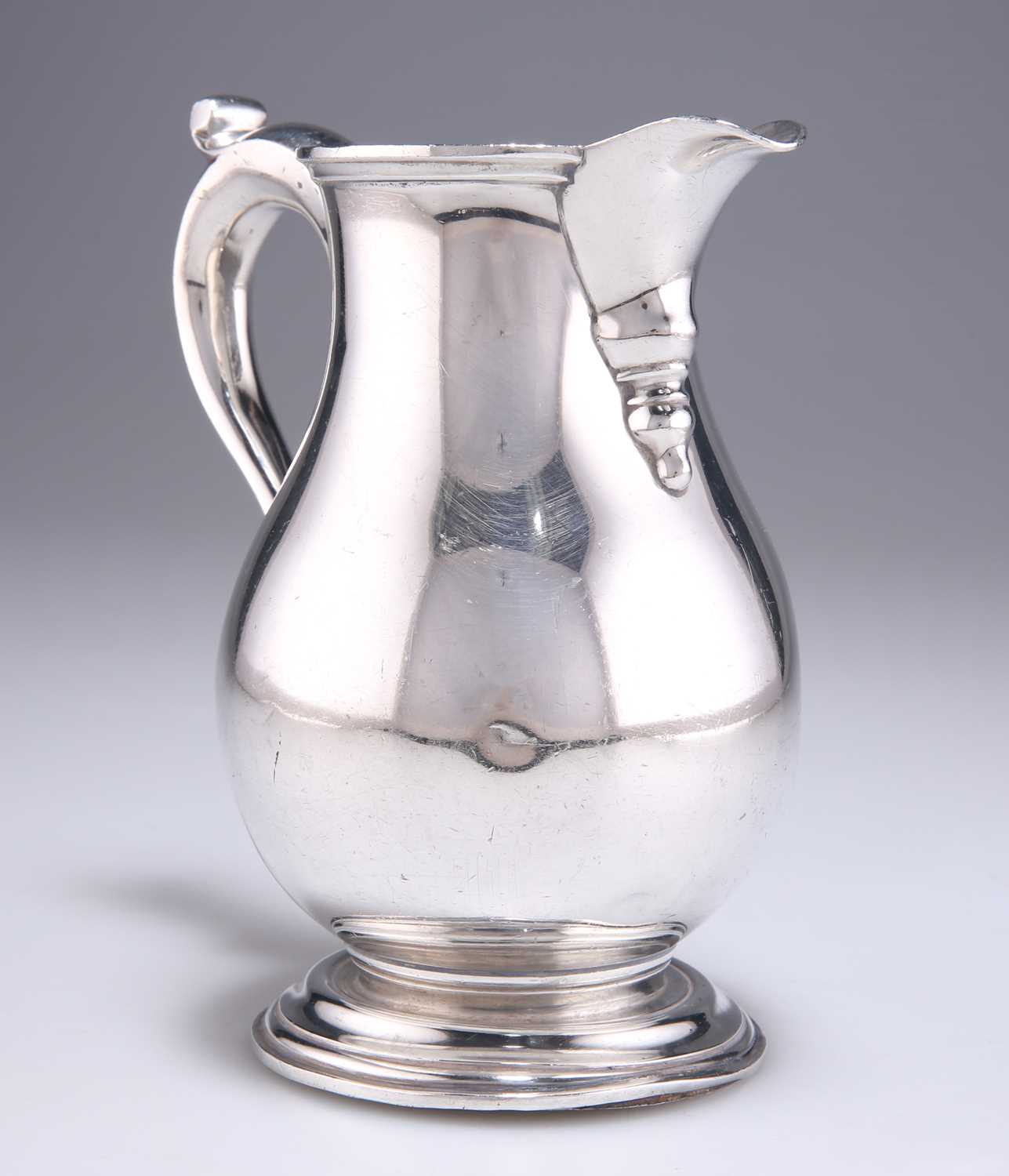 Lot 1203 - † AN ELIZABETH II SILVER MILK JUG