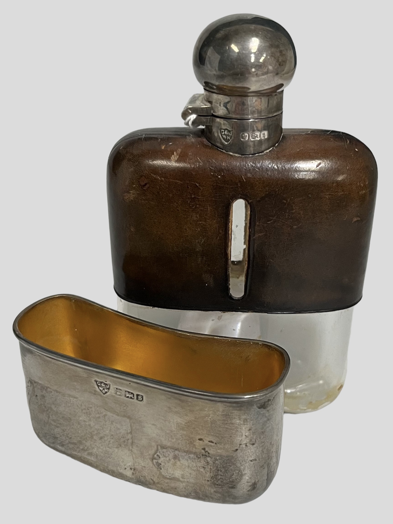 Lot 1036 - A GEORGE V SILVER-MOUNTED SPIRIT FLASK