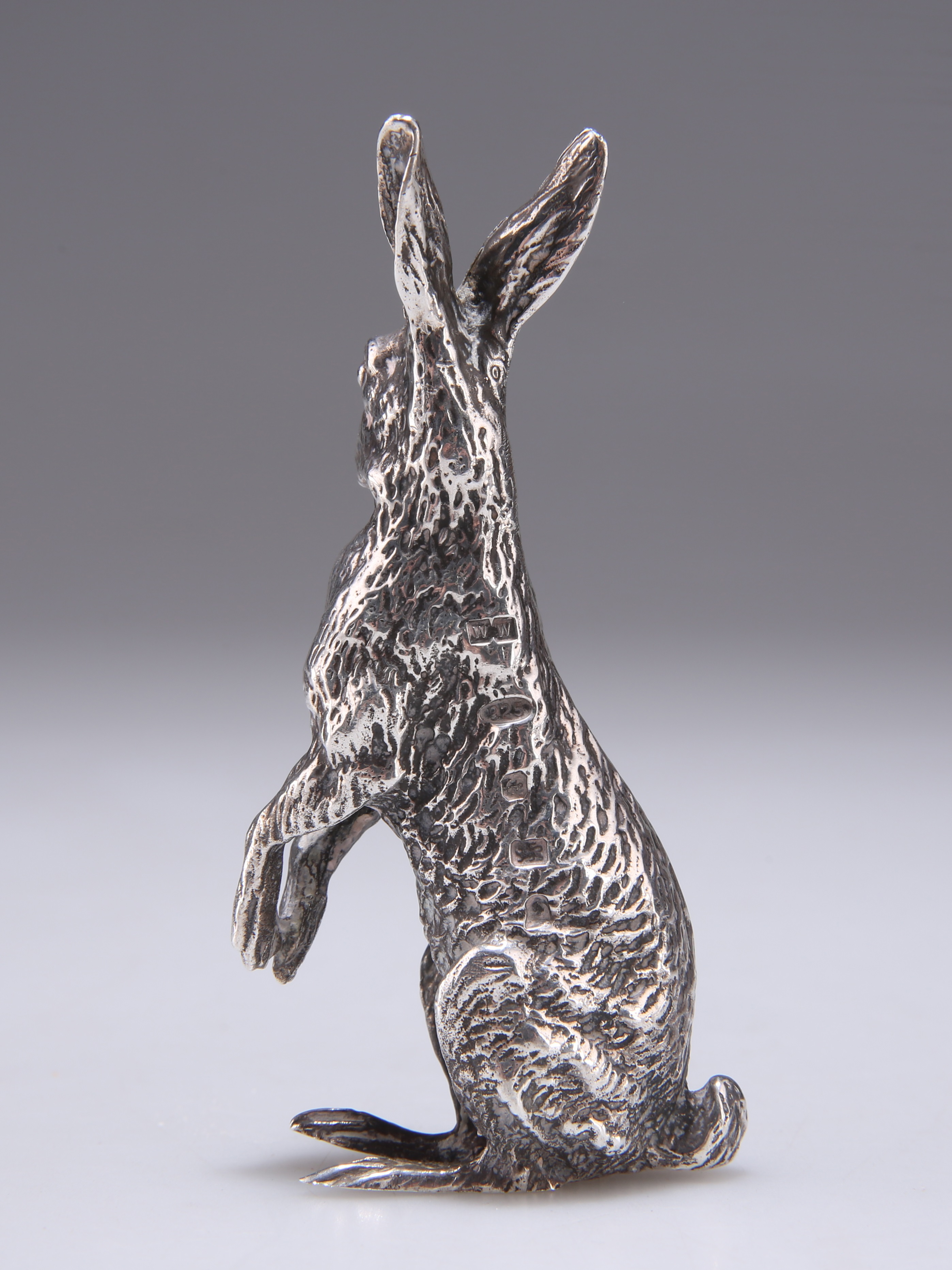 Lot 129 - AN ELIZABETH II CAST SILVER MODEL OF A HARE